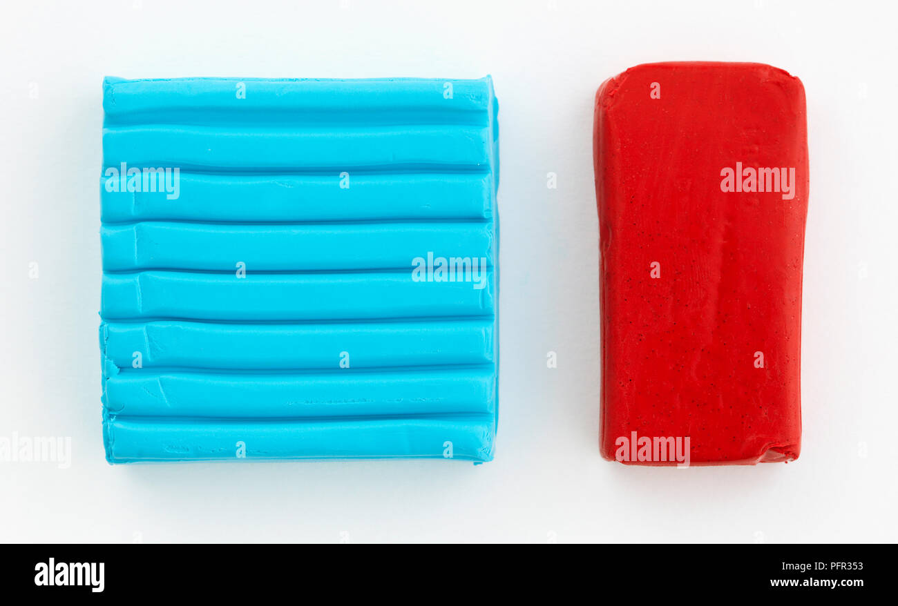 Blue and red pieces of polymer clay Stock Photo - Alamy