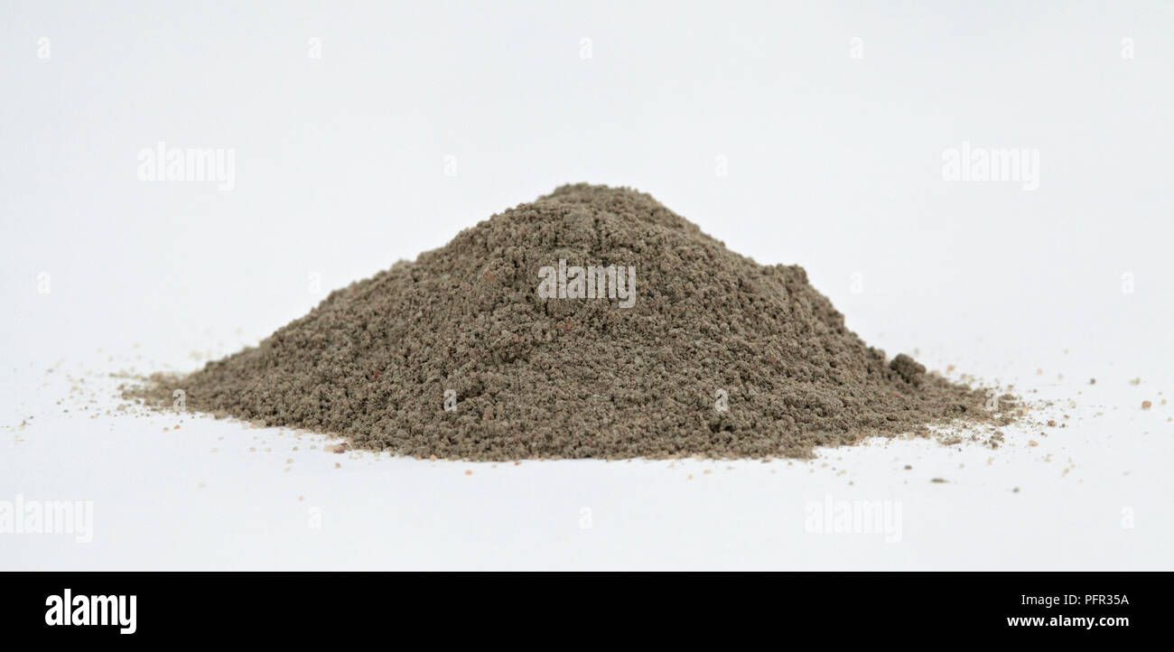 Heap of cement-based tiling adhesive Stock Photo - Alamy