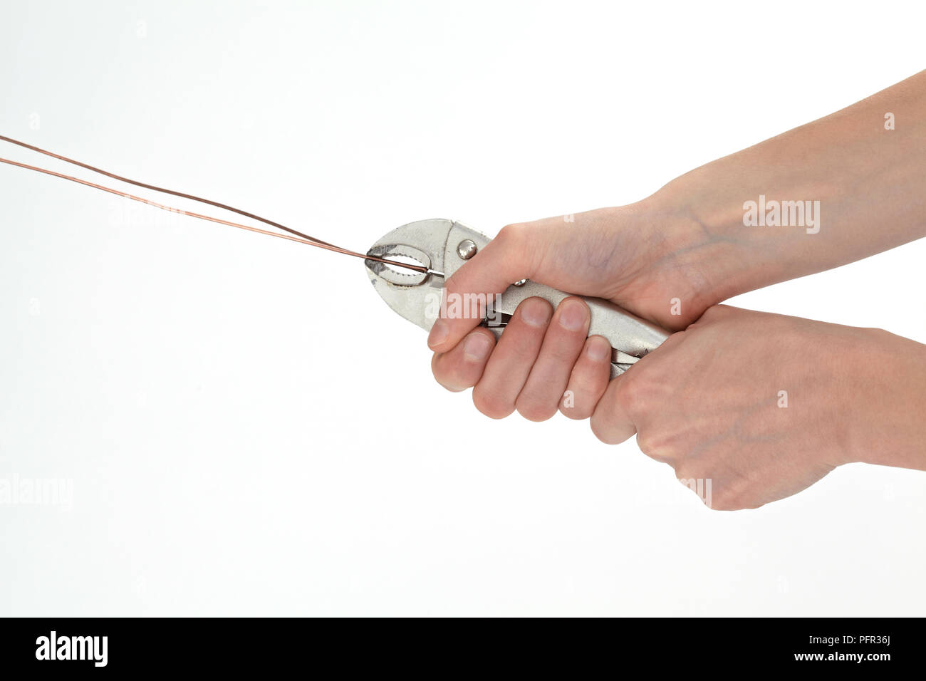 Length of wire bent in half, attached to a fixing point, and the two ...