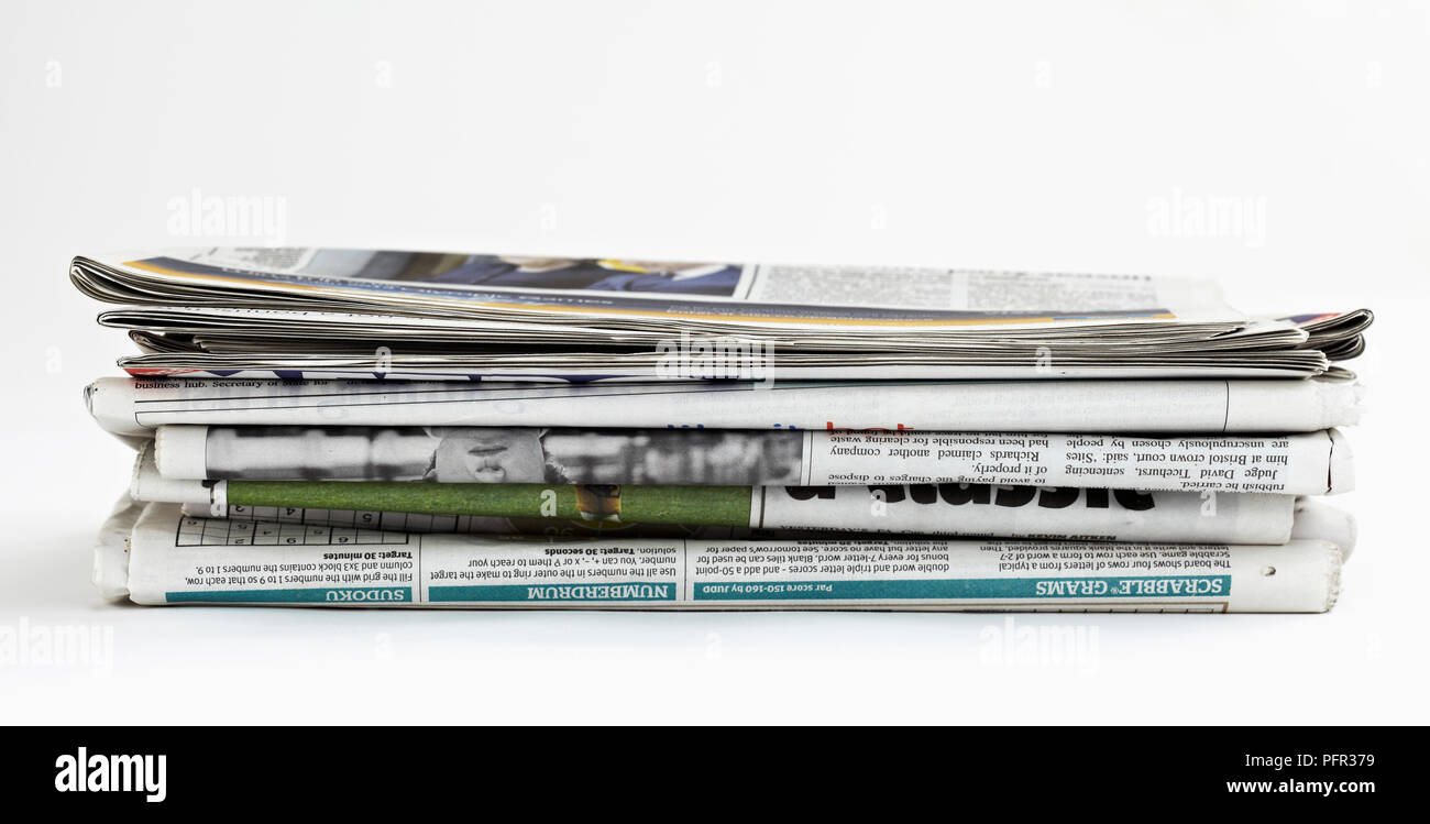 Pile of newspapers Stock Photo - Alamy