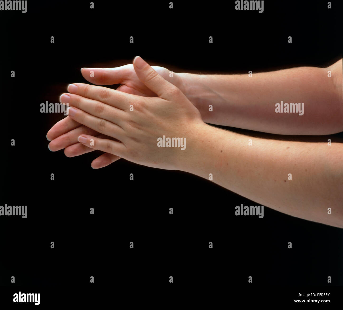 Black hand clapping close up hi-res stock photography and images - Alamy