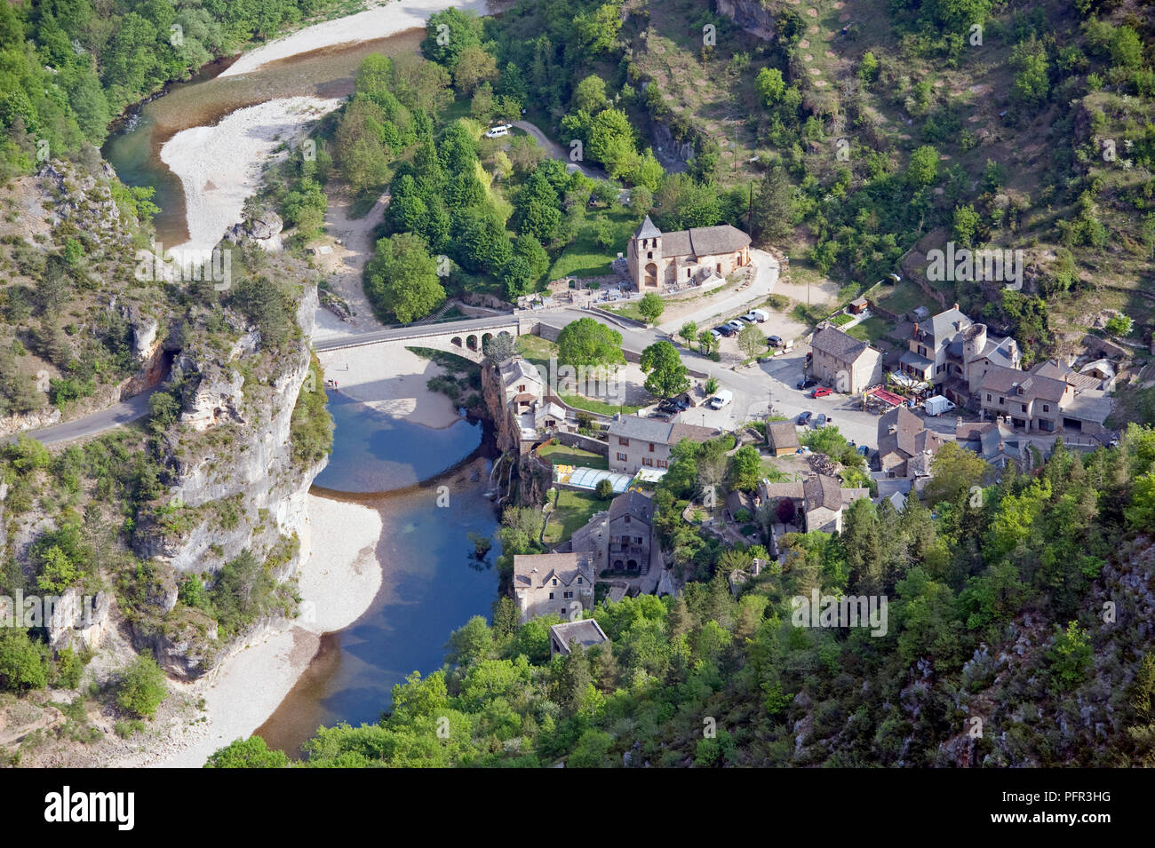 France, Gorges du Tarn, village built at the edge of the Tarn river in ...