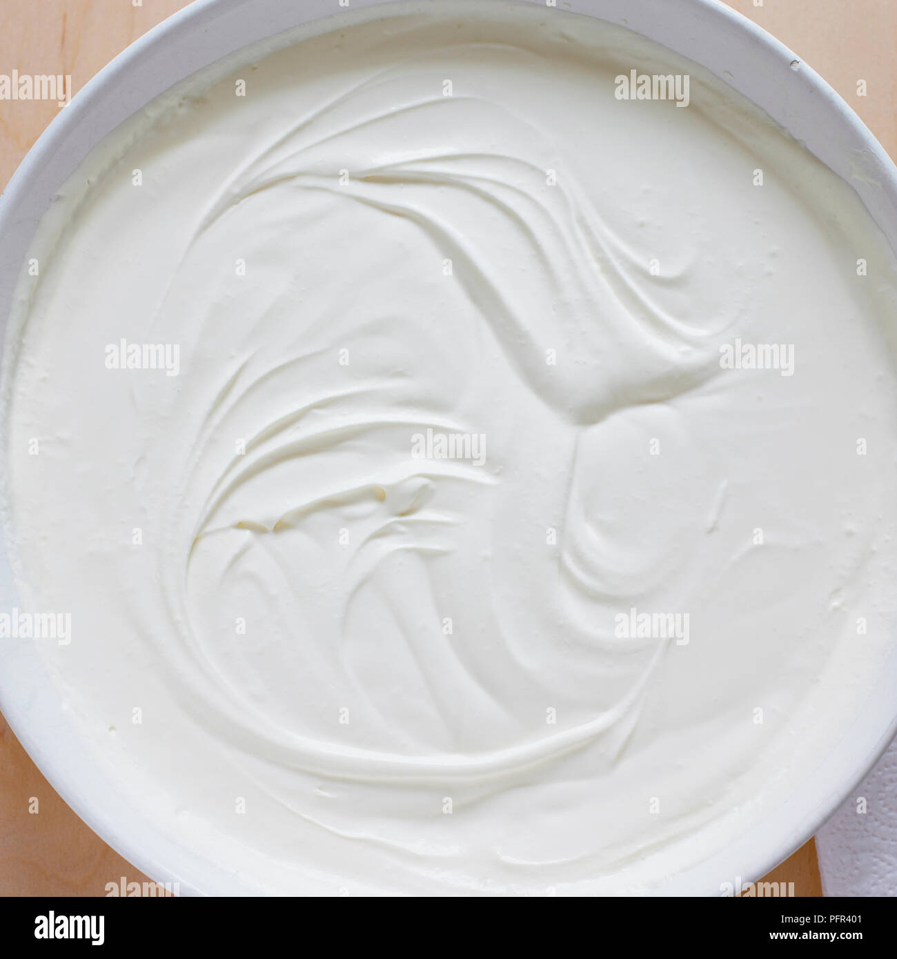 Bowl of cream Stock Photo - Alamy