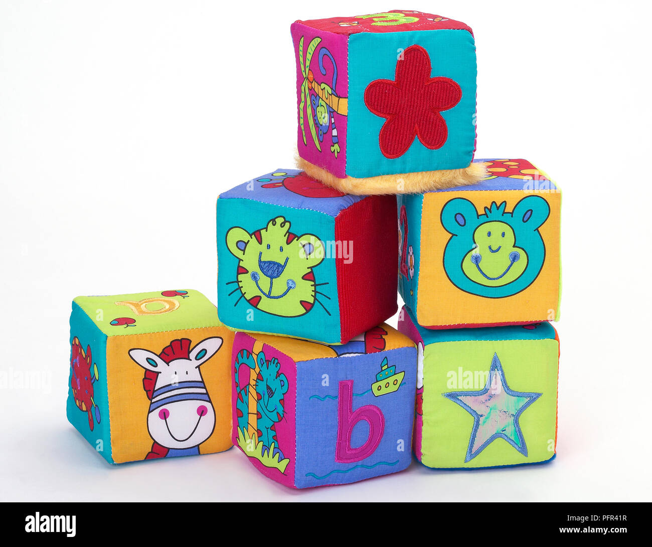 Soft toy cubes with colourful pictures on the front and sides Stock ...