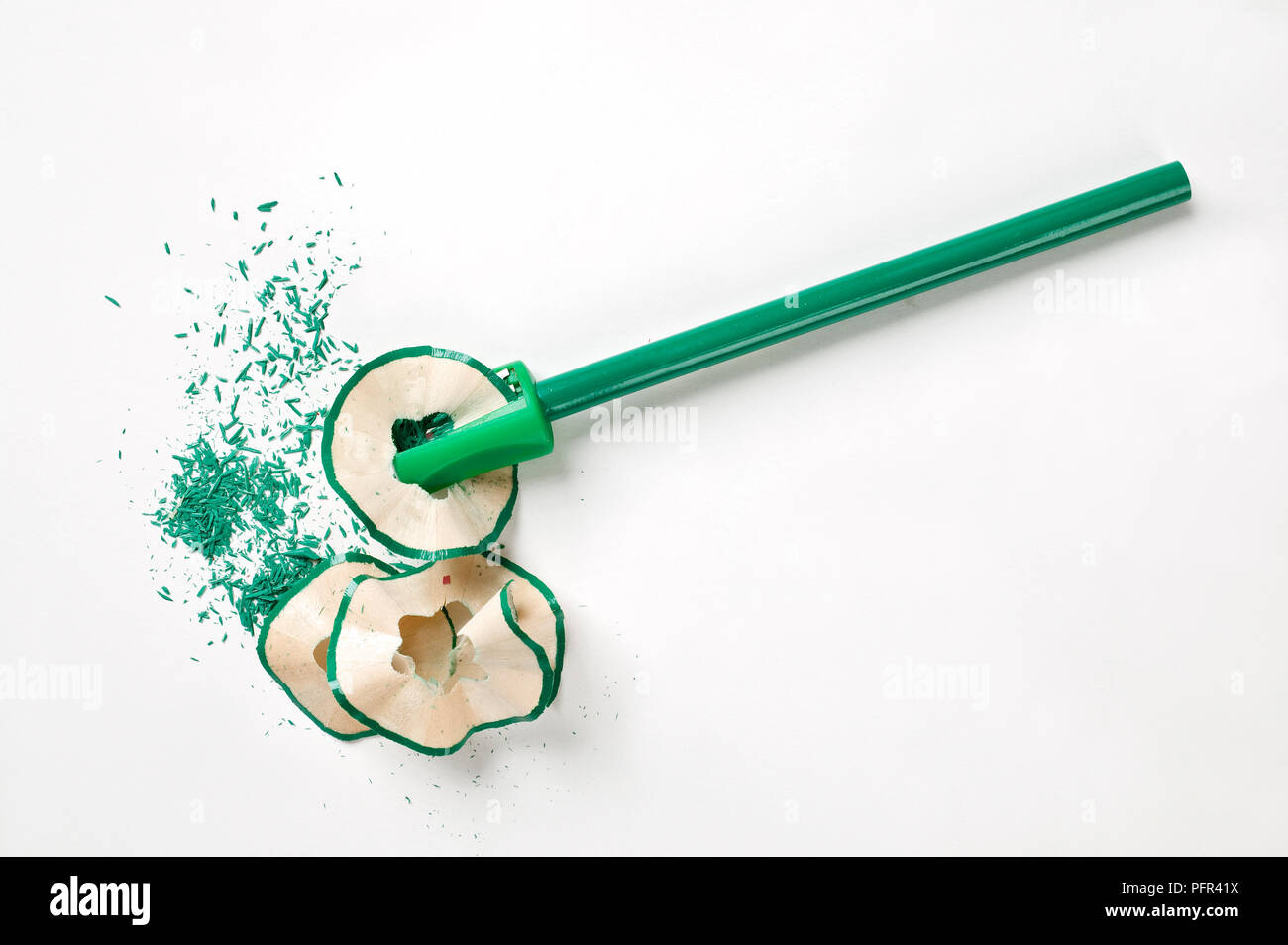Sharpening green pencil Stock Photo - Alamy