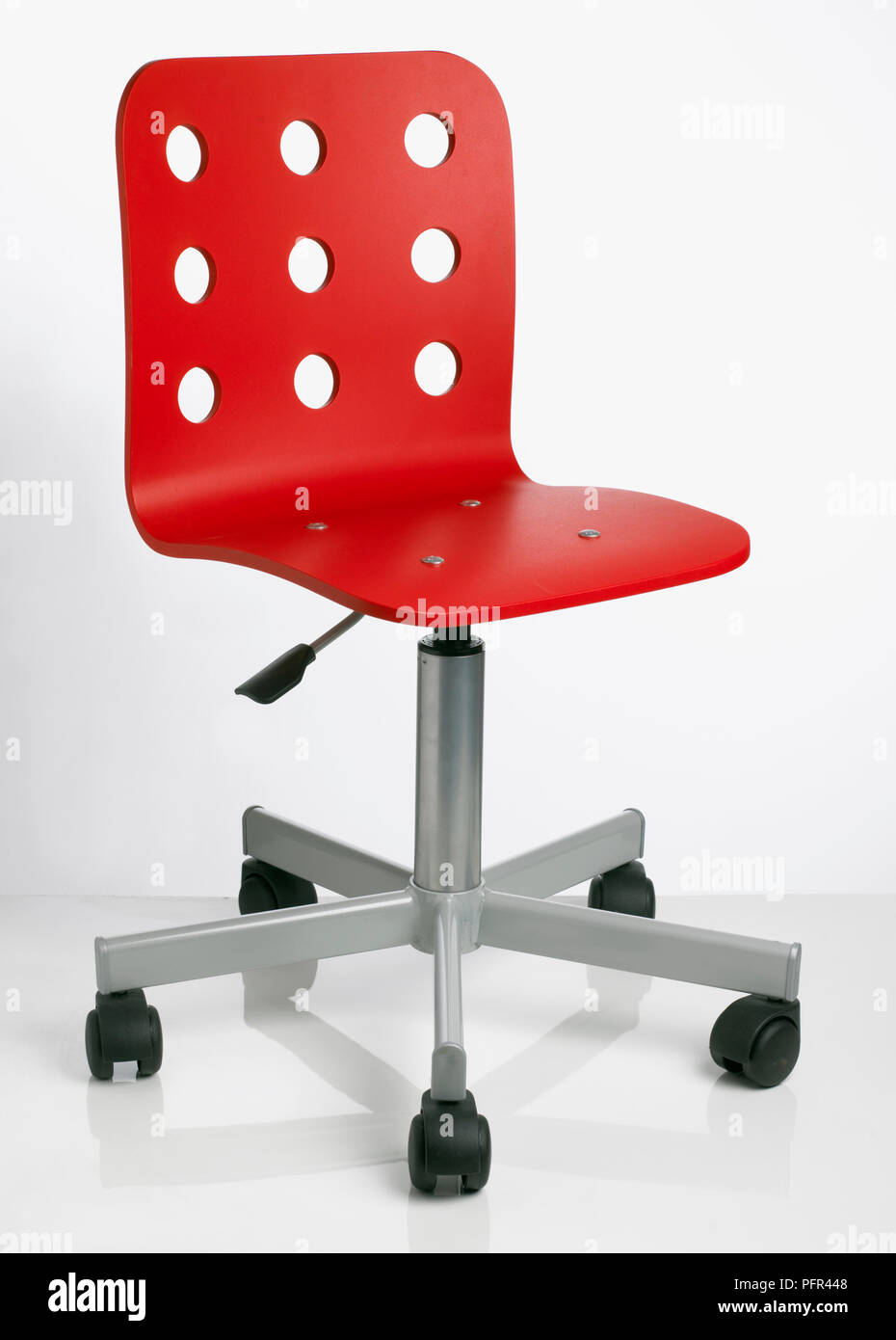 Red swivel chair Stock Photo - Alamy