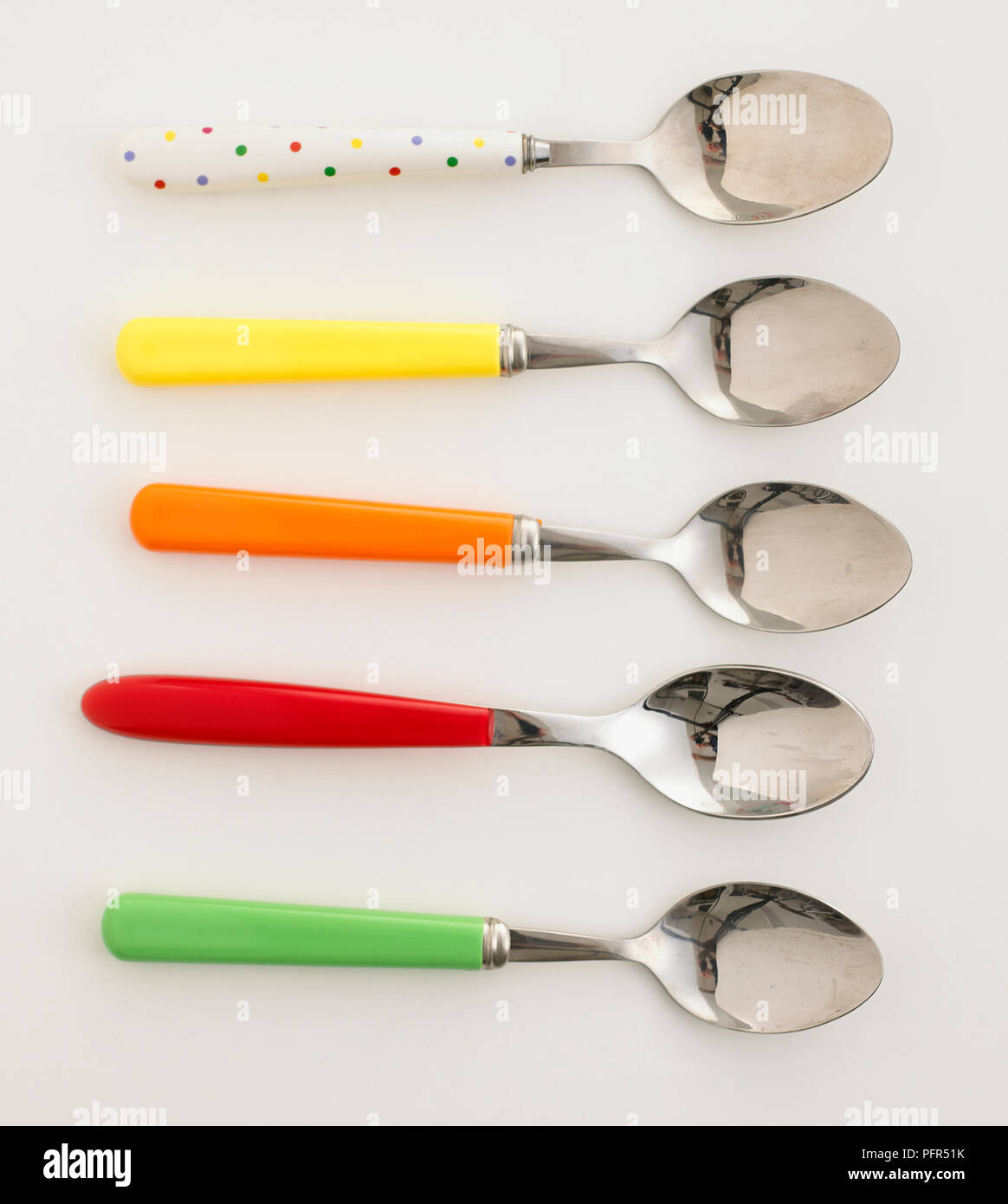 5 colourful teaspoons Stock Photo - Alamy