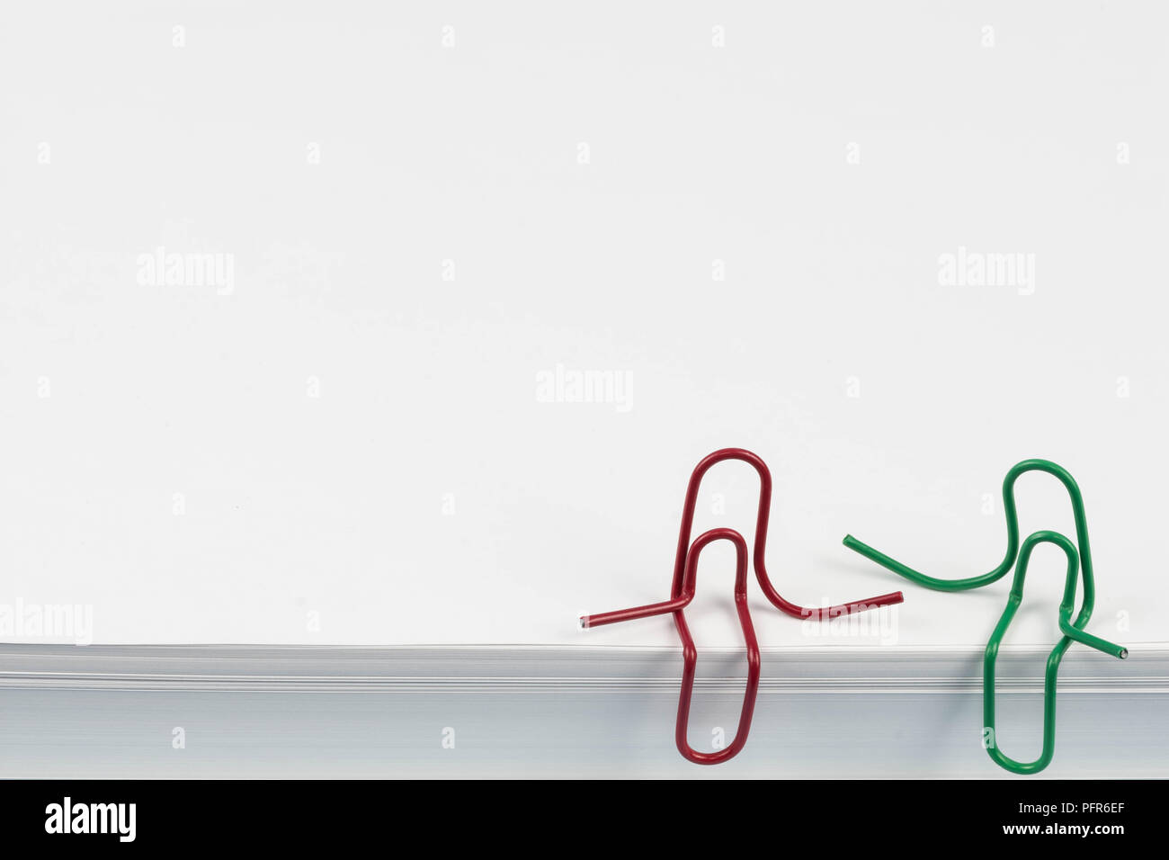 Purple paperclip hi-res stock photography and images - Alamy