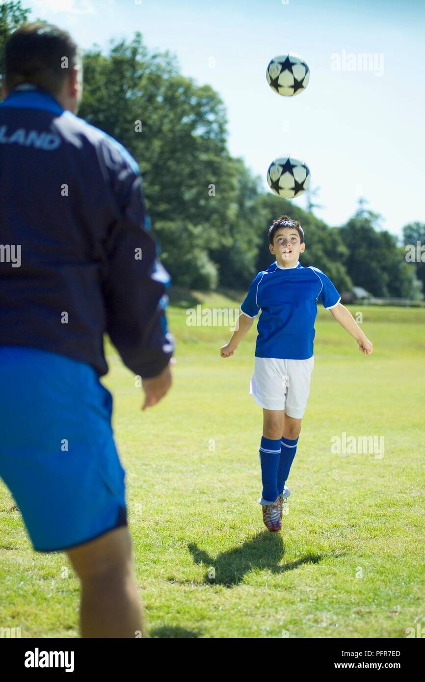 Football strip heading ball hi-res stock photography and images - Alamy
