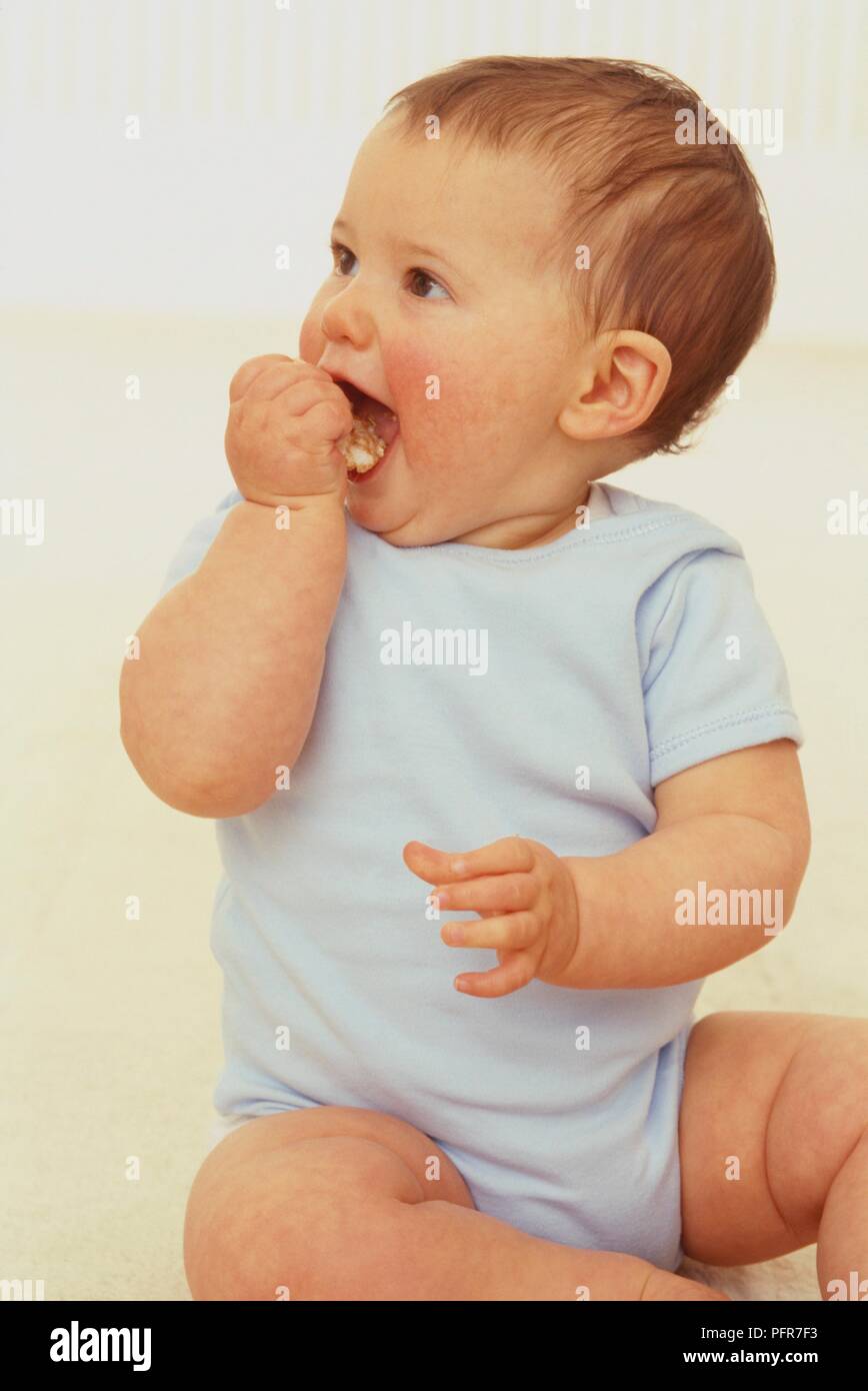 Greedy toddler hi-res stock photography and images - Alamy