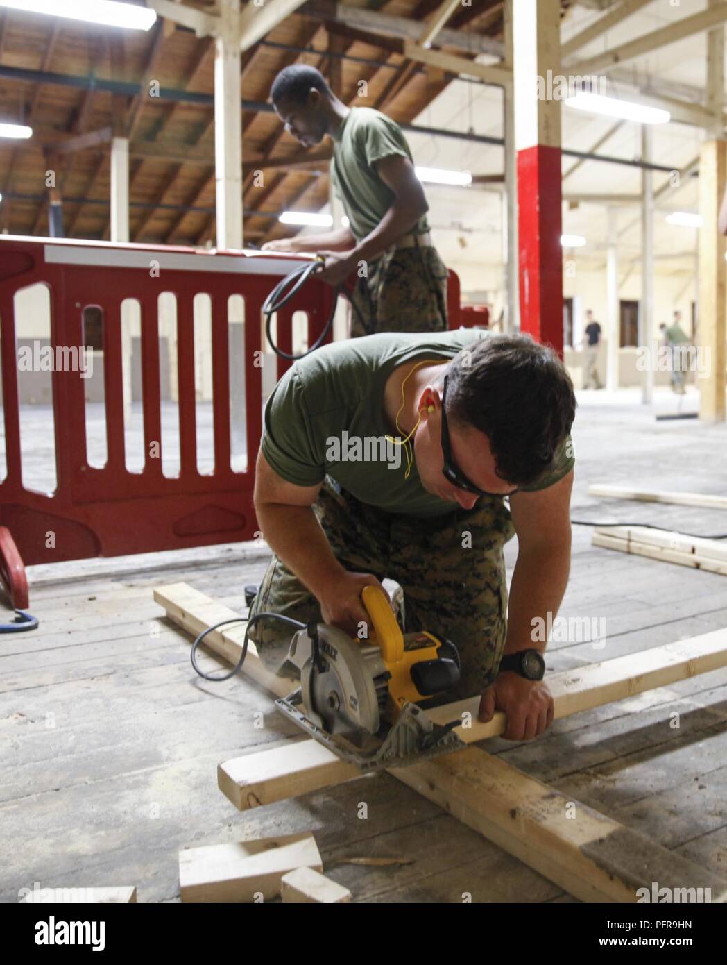 U.S. Marine Sgt. Charles R. Ross, squad leader with Headquarters and ...