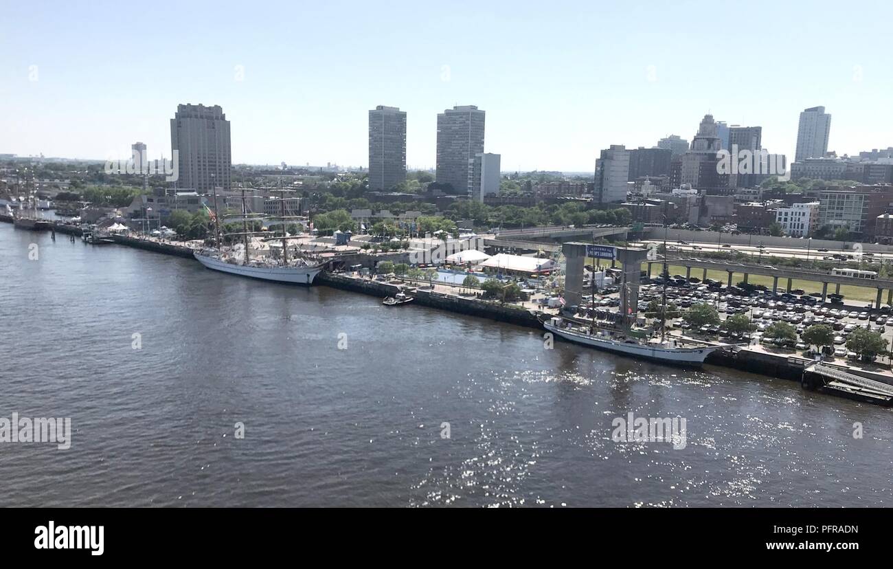 The Coast Guard enforces a safety zone as tall ships from around the ...