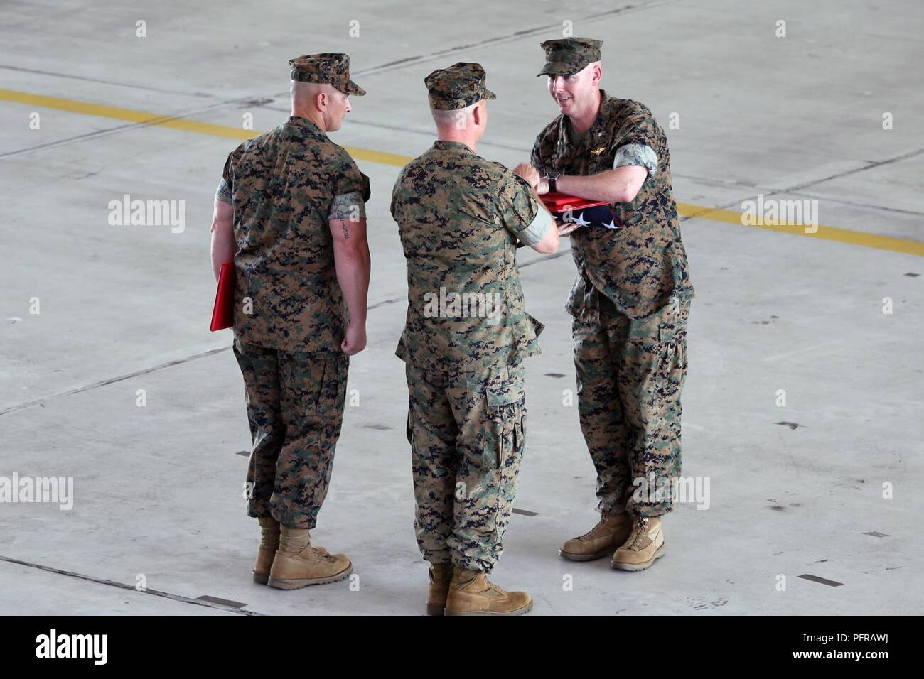 Lt. Col. Jason Donovan accepts awards during the Headquarters and ...