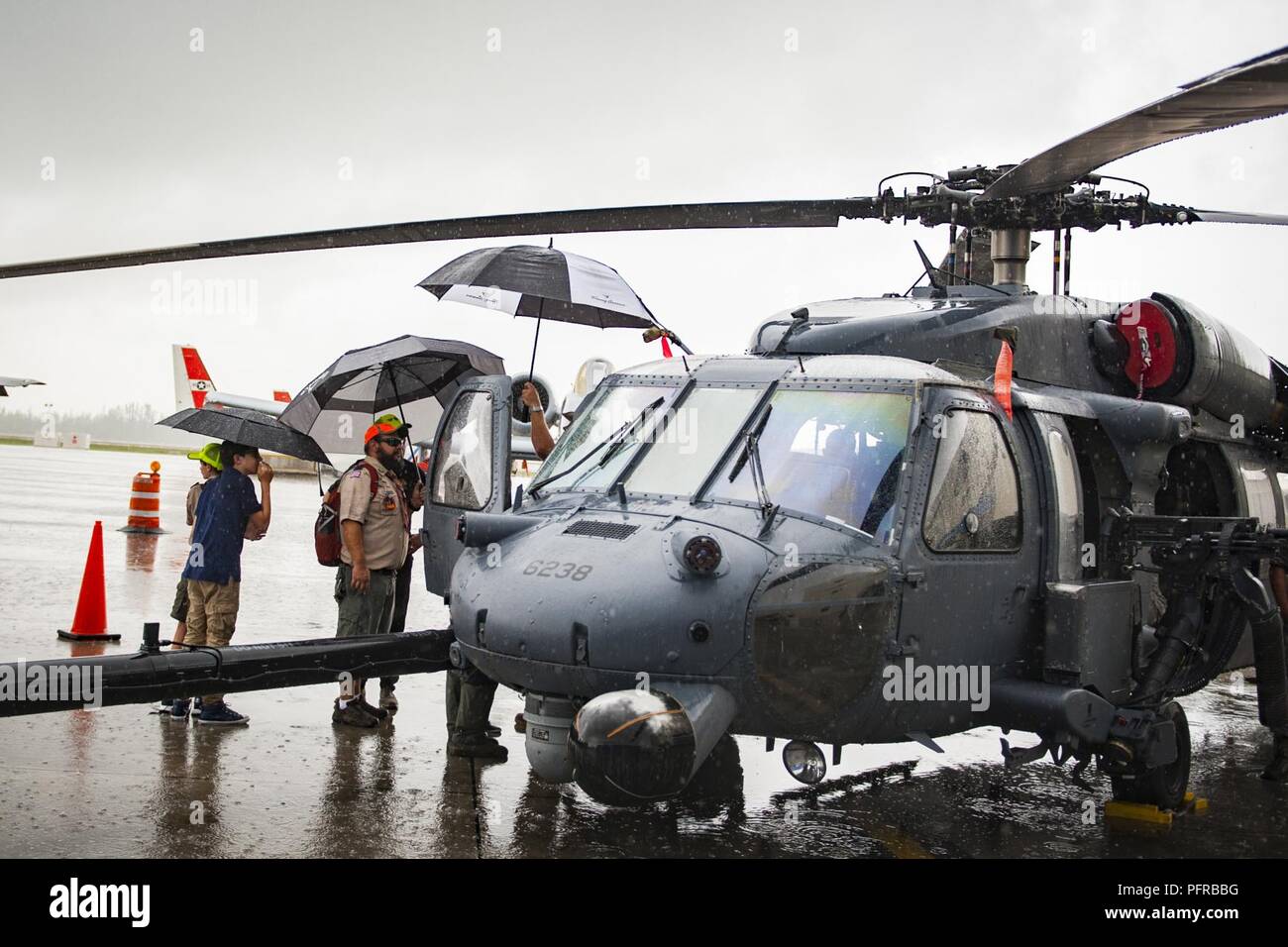 Children and adults from the Boy Scouts of America hang out with ...