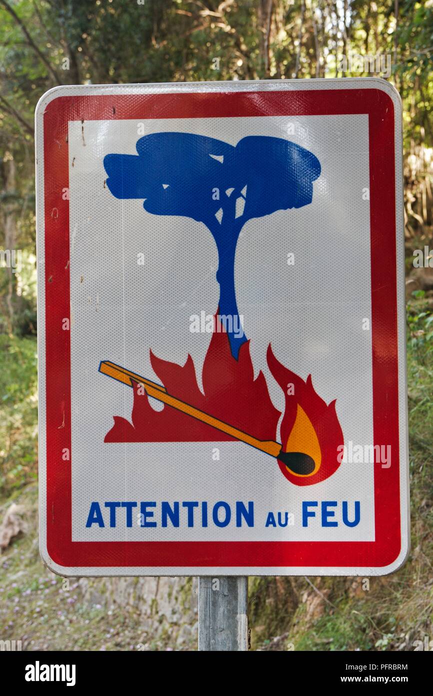 Corsica, fire warning sign on post written in French Stock Photo - Alamy