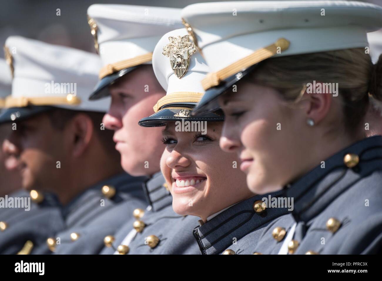U.S. Military Academy cadets take their seats on the field to kick off ...