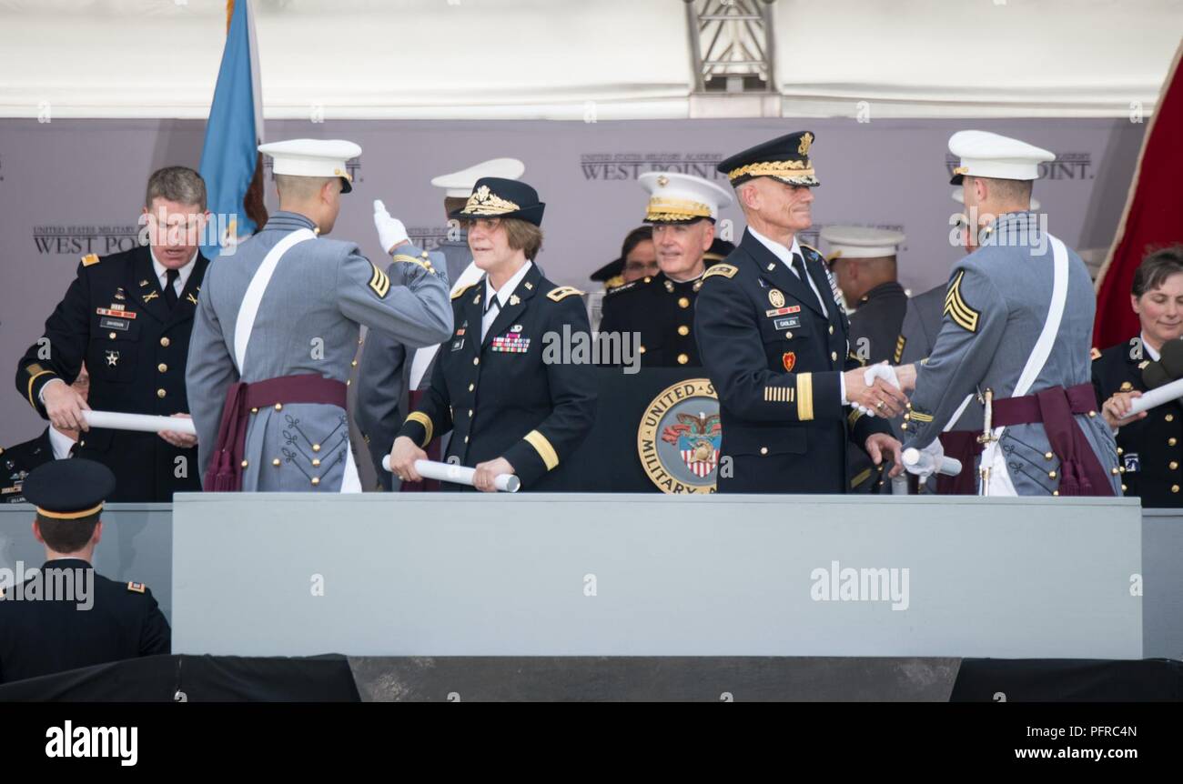 U.S. Military Academy cadets recieve their diplomas during their ...