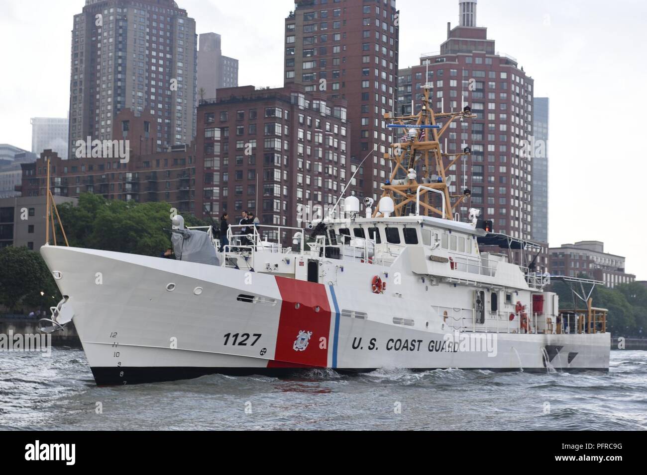 U.S. Coast Guard Cutter Richard Snyder transits near Lower Manhattan ...