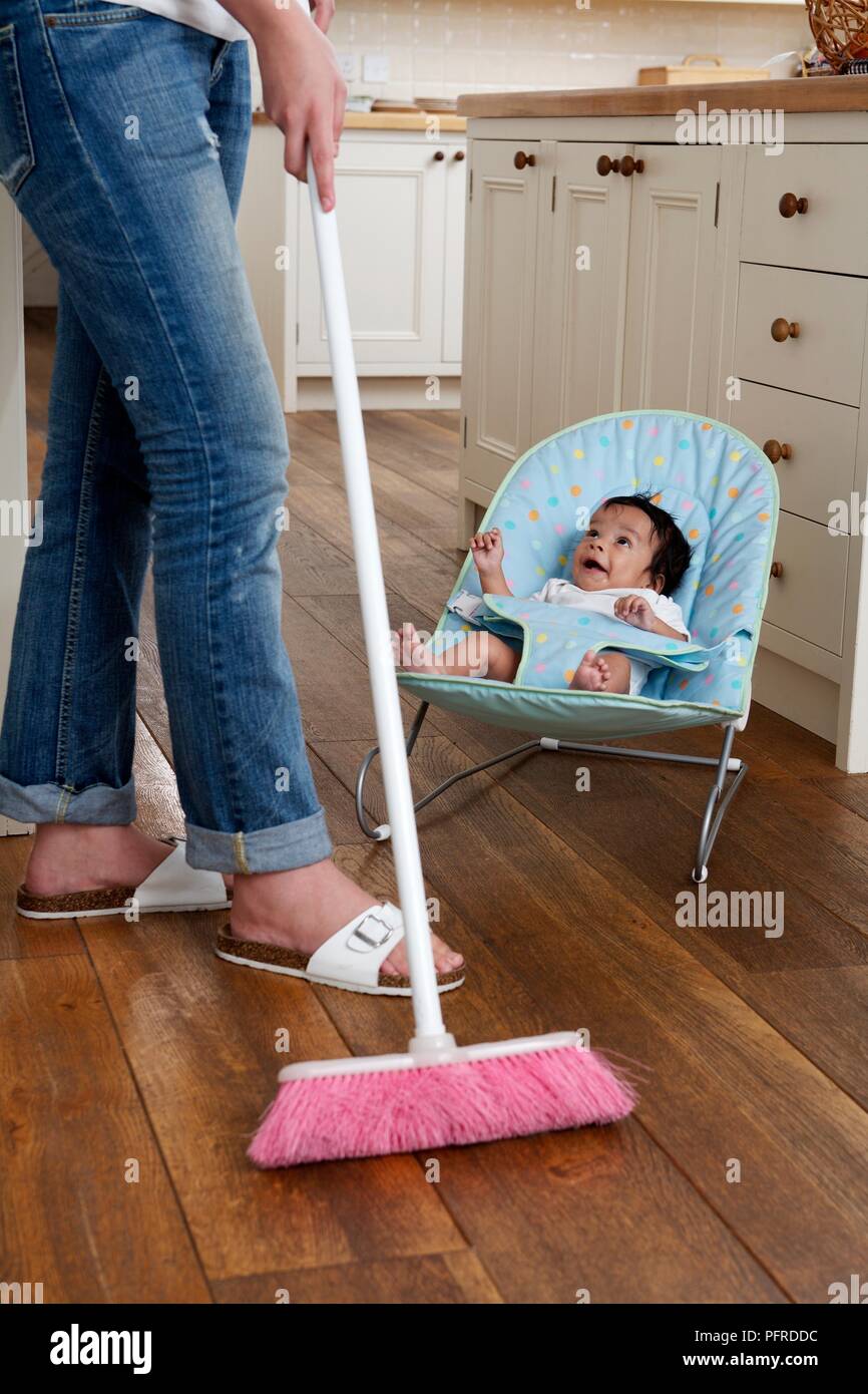 Sweeping with a broom hi-res stock photography and images - Alamy