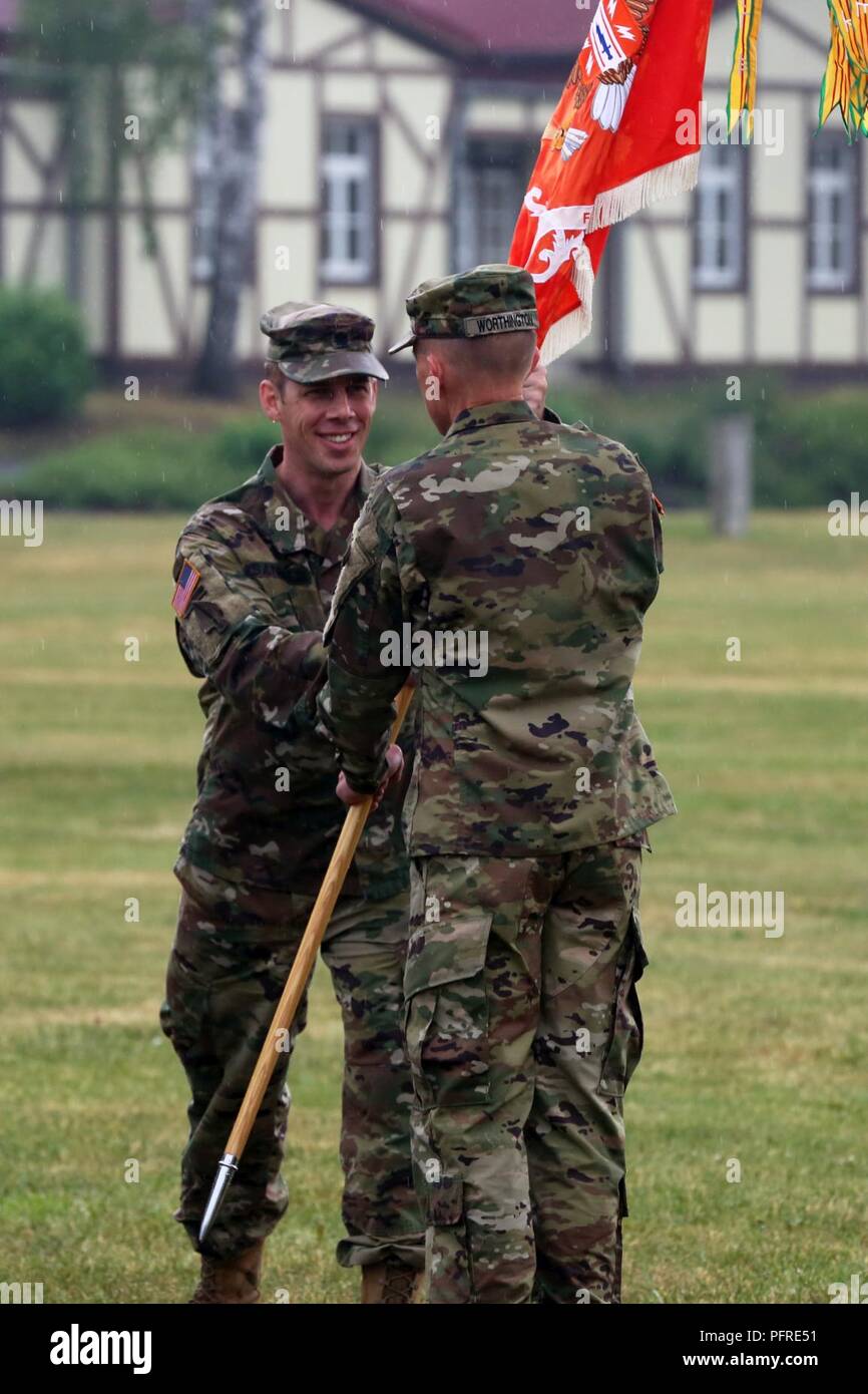 U.S. Army Lt. Col. Adam Sannutti passes the 44th Expeditionary Signal ...