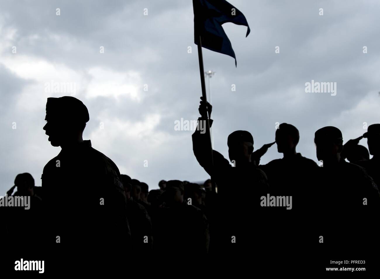 Airmen from the 93d Air Ground Operations Wing (AGOW) render salutes ...