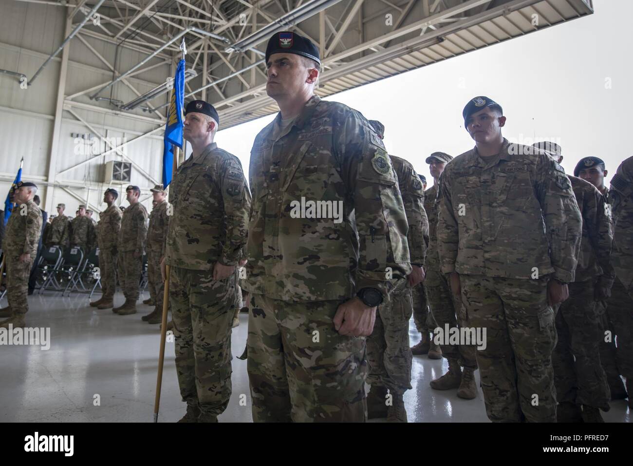 Airmen from the 93d Air Ground Operations Wing (AGOW) stand at ...