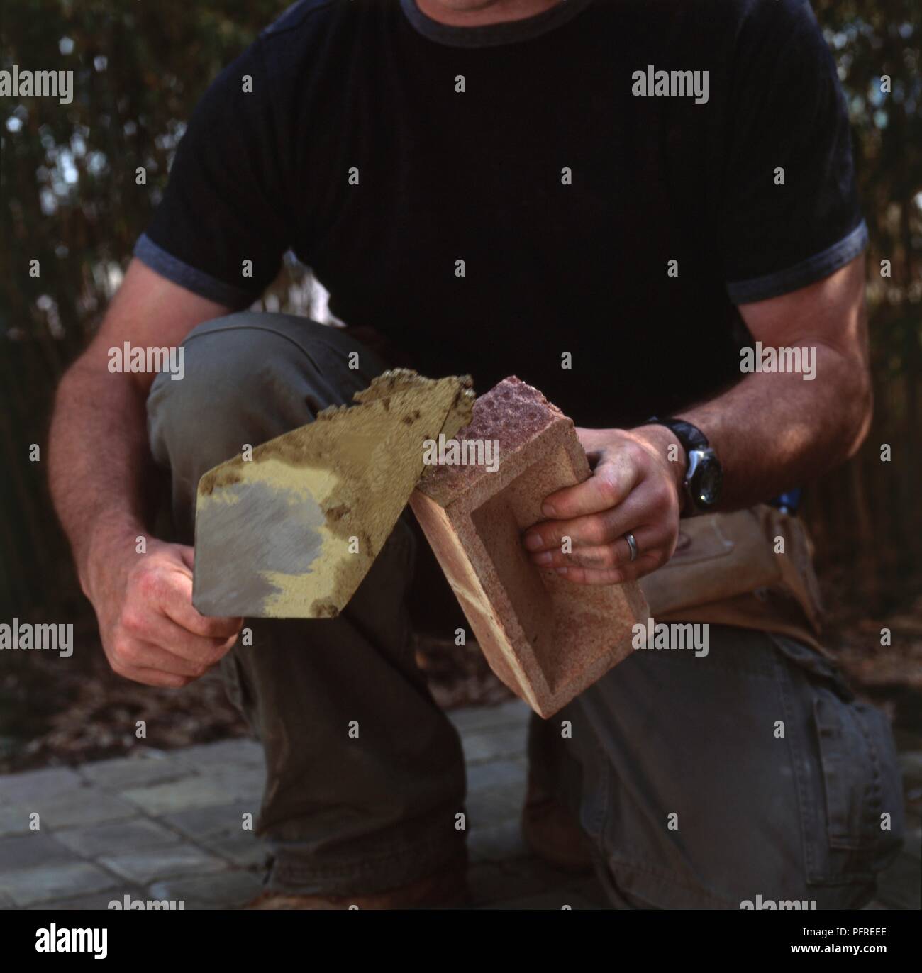 Spreading cement hi-res stock photography and images - Alamy