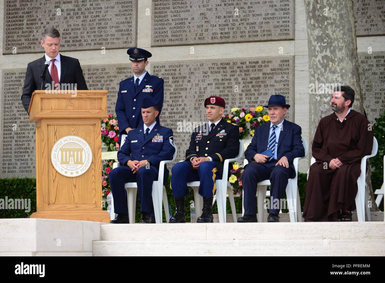 U.S. Consul General in Florence, Benjamin V. Wohlauder reads a ...