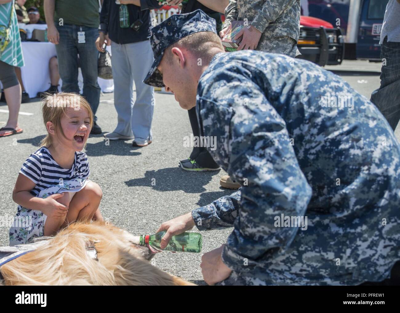 Children play with the Walter Reed National Military Medical Center ...