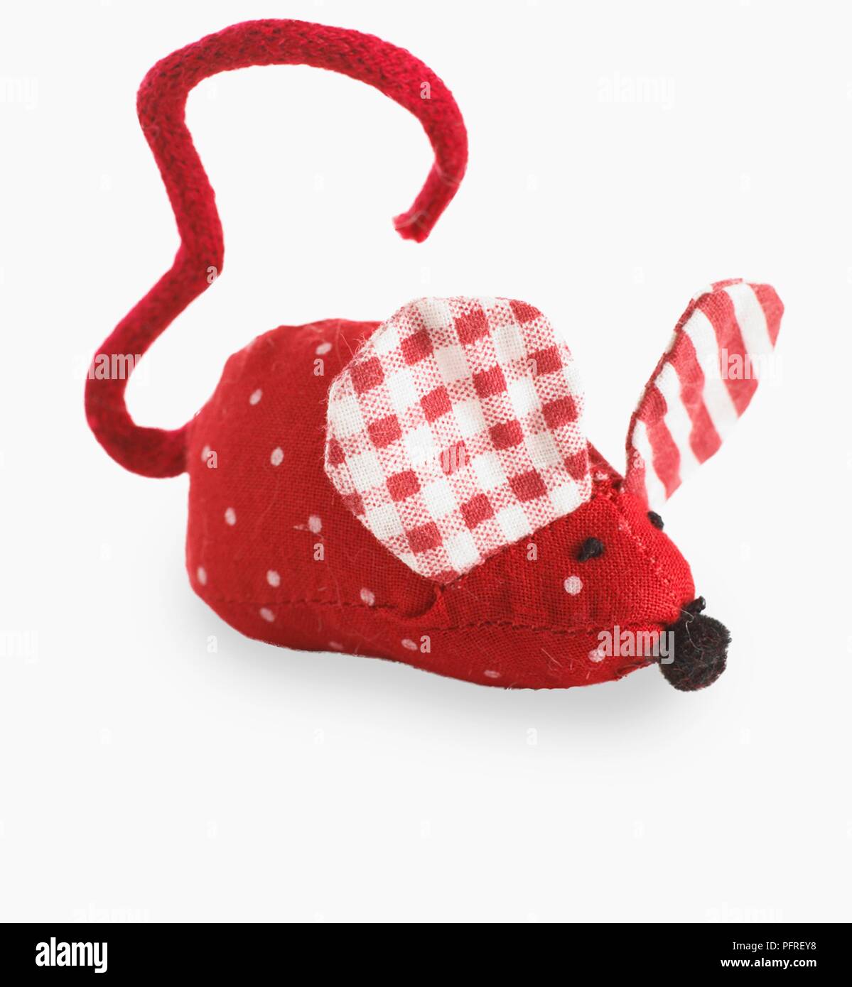 Red and white polka dot toy mouse Stock Photo - Alamy