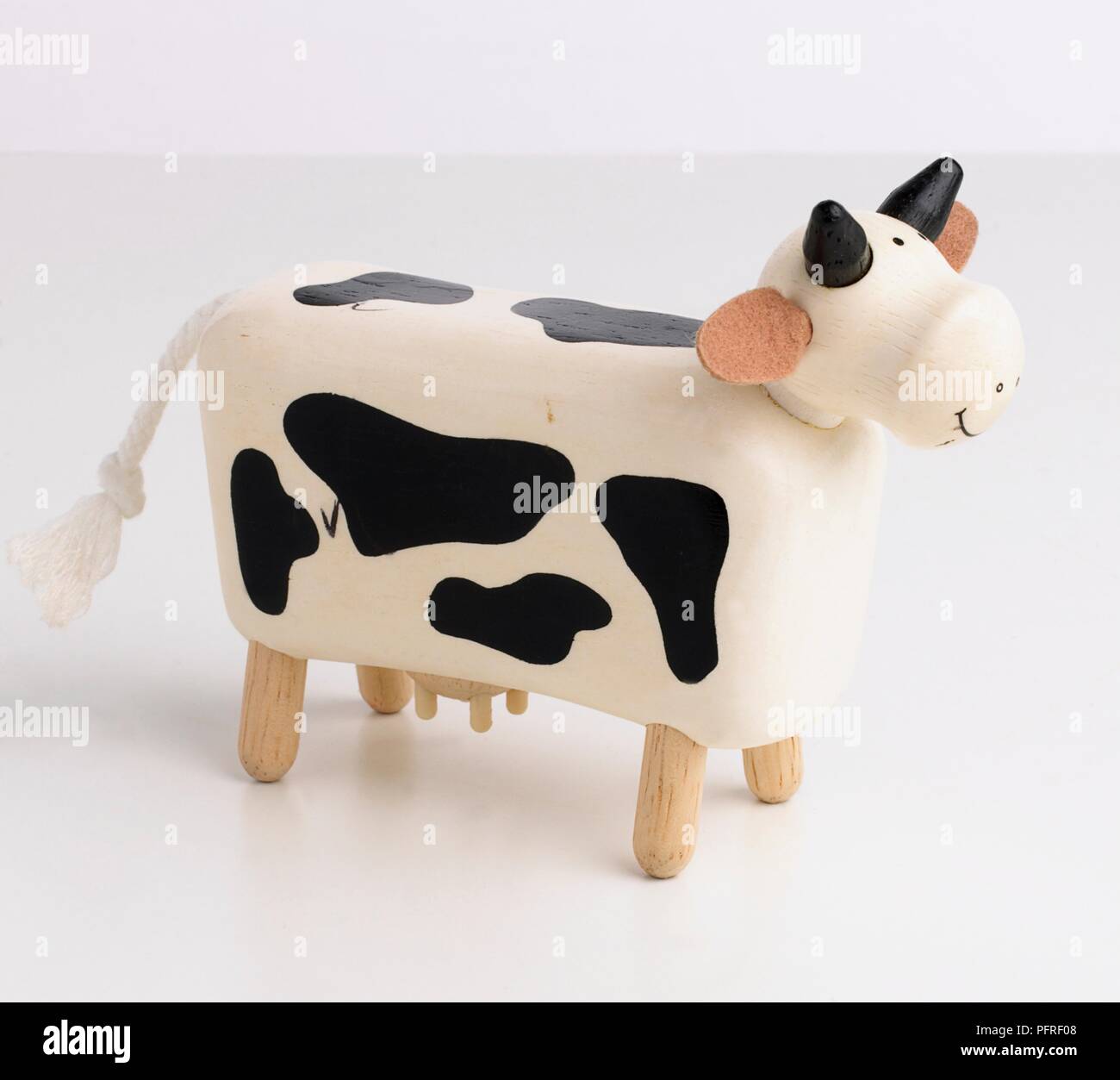 Plastic toy cow Stock Photo - Alamy