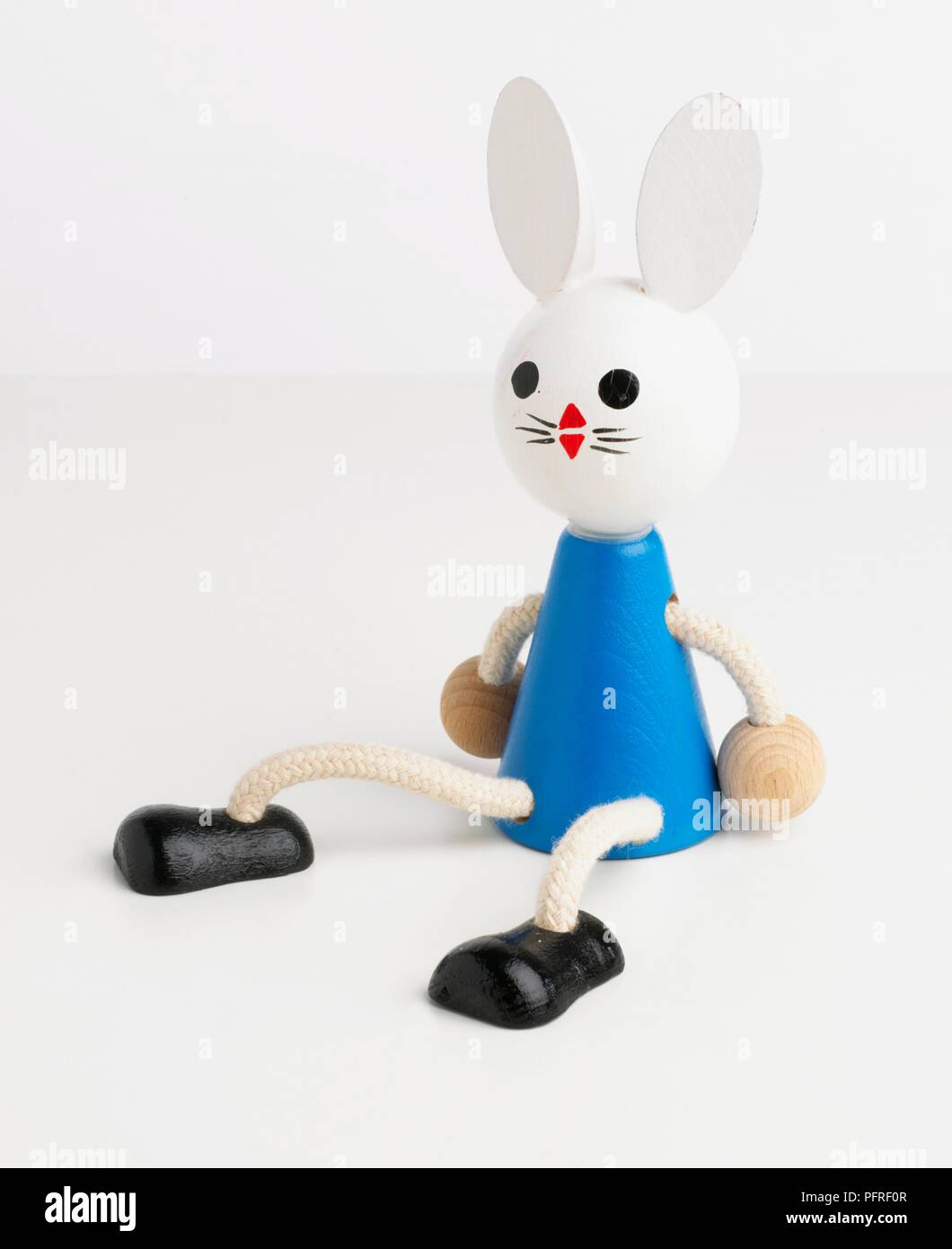 Plastic and rope toy rabbit Stock Photo - Alamy