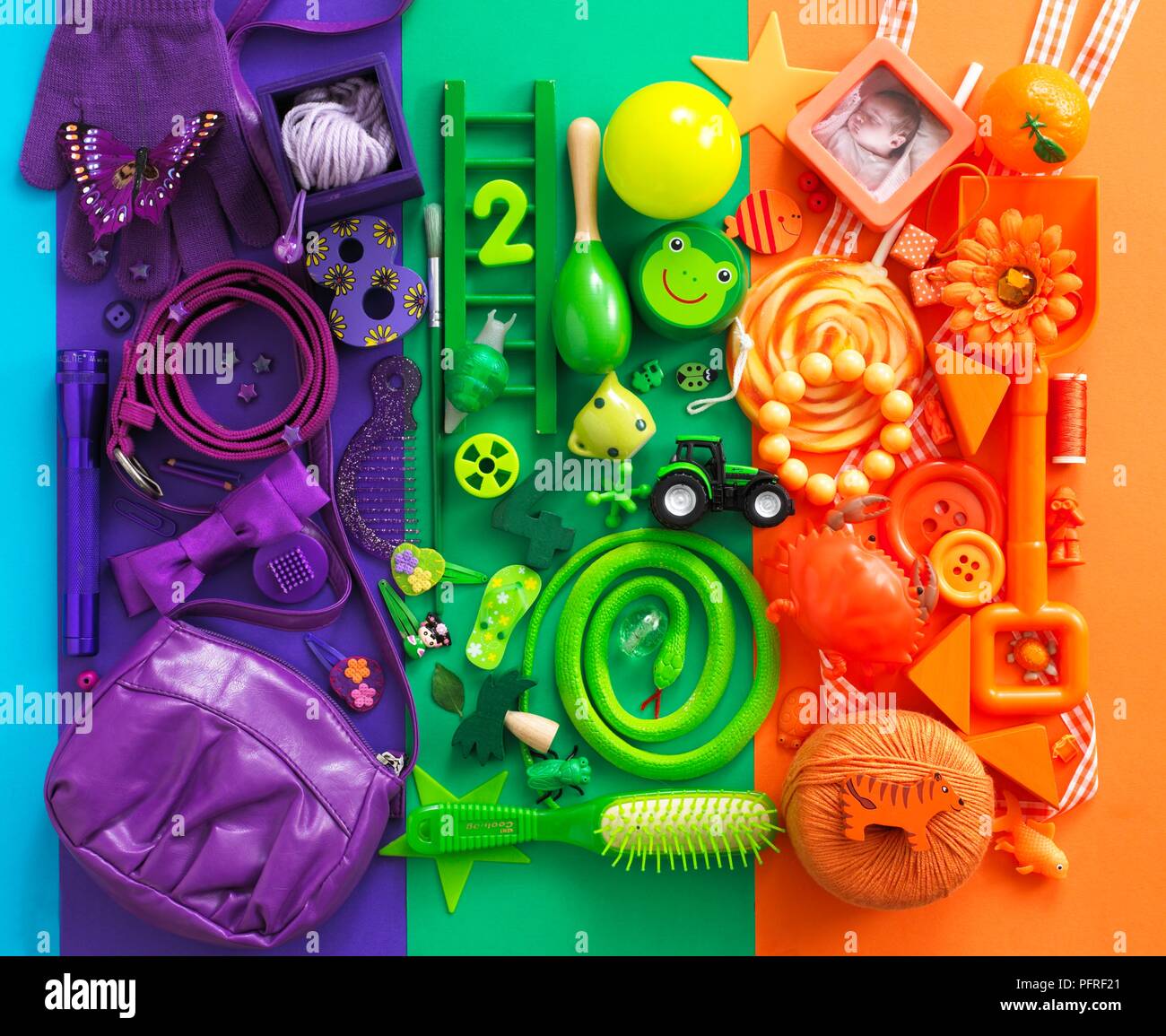 Purple, green and orange toys Stock Photo - Alamy