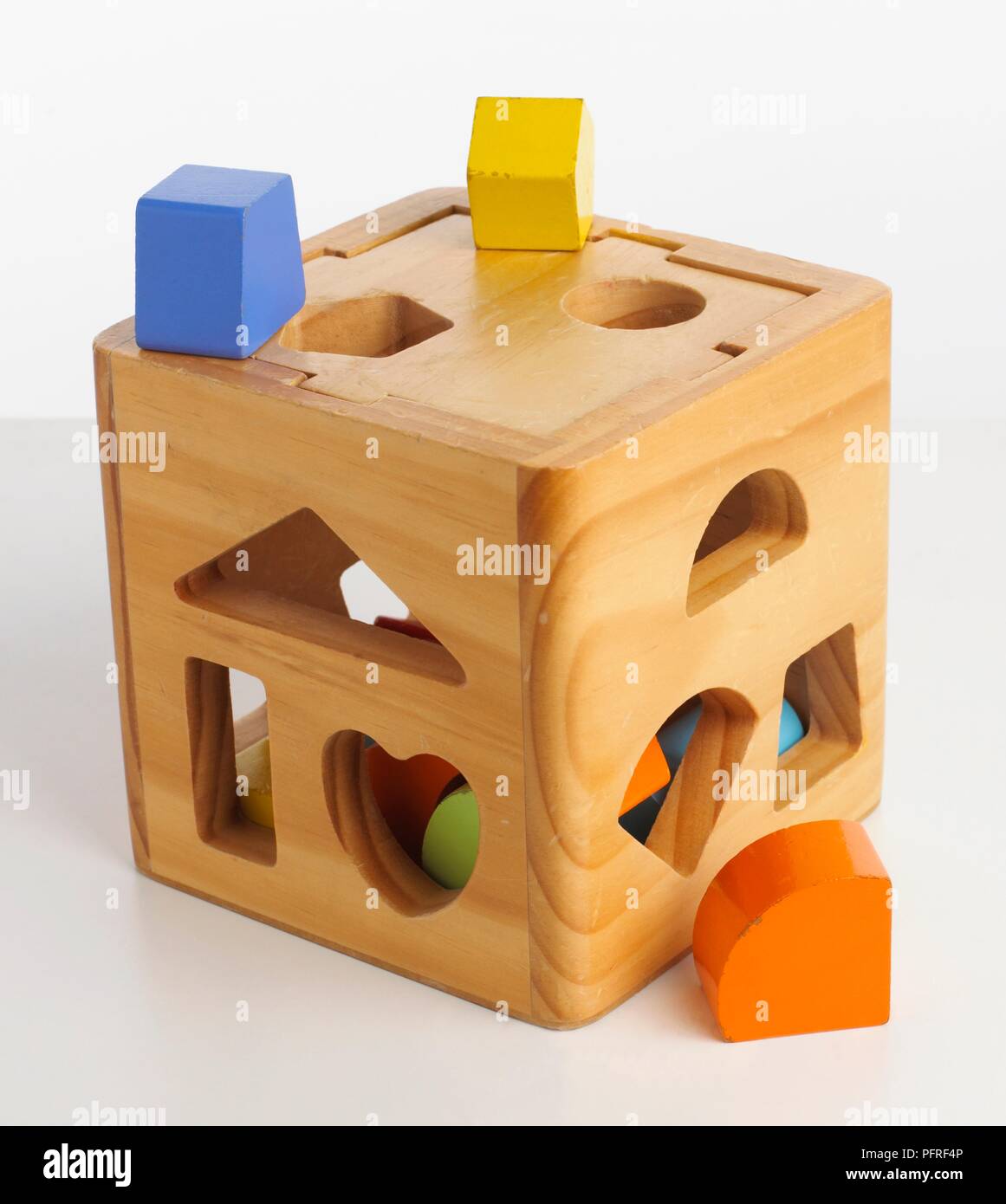 Wooden block shape sorting box Stock Photo - Alamy