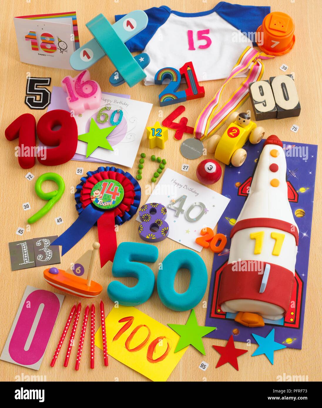 A selection of toys, clothes, and stationery with different numbers on ...