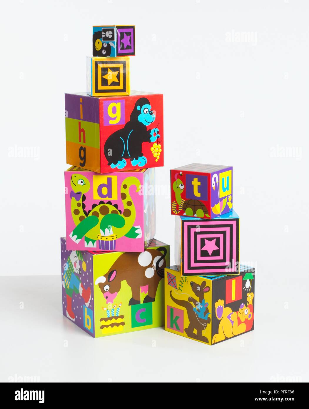 Stacks of colourful cubes with animals and letters on Stock Photo - Alamy