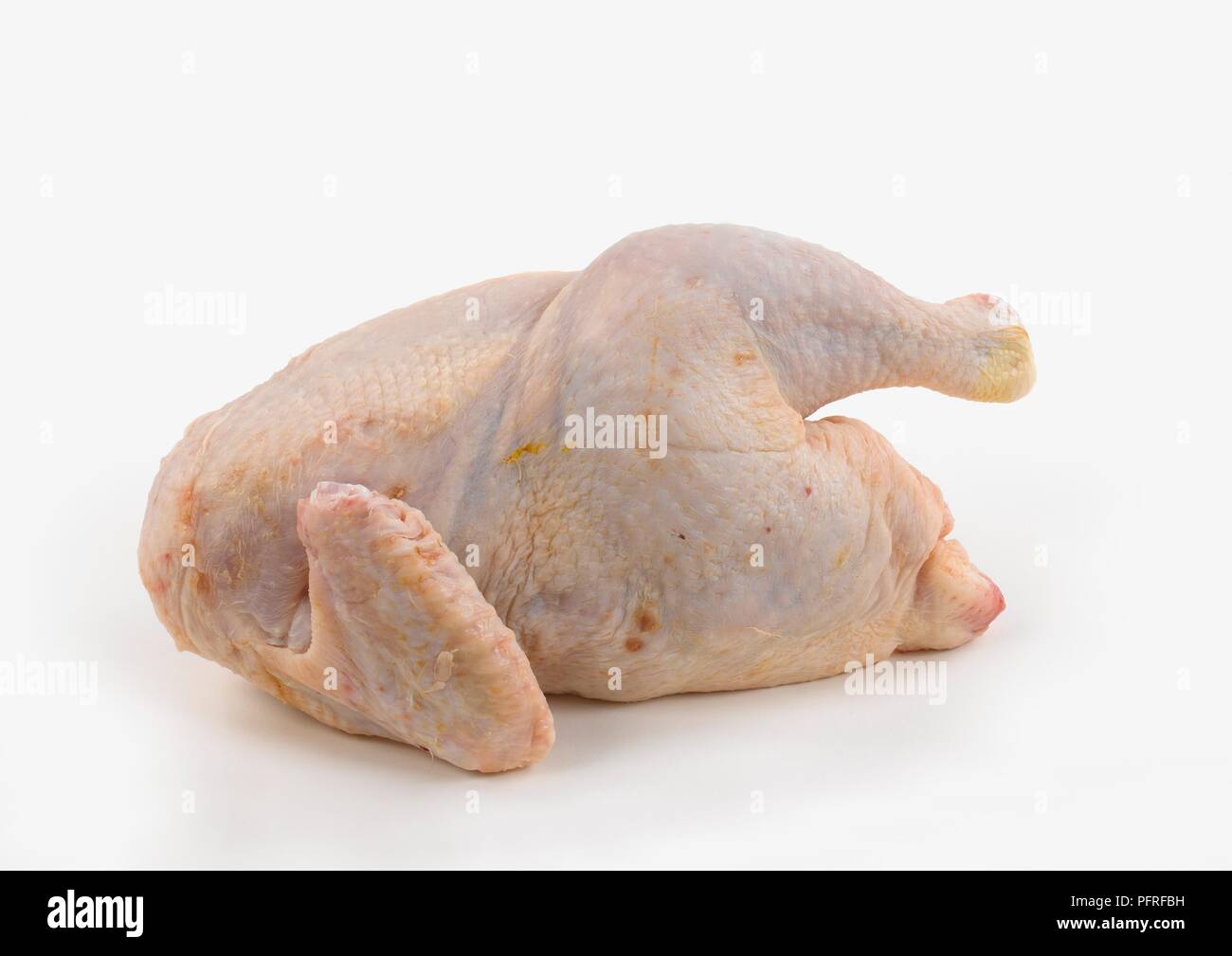Raw chicken sliced in half Stock Photo - Alamy
