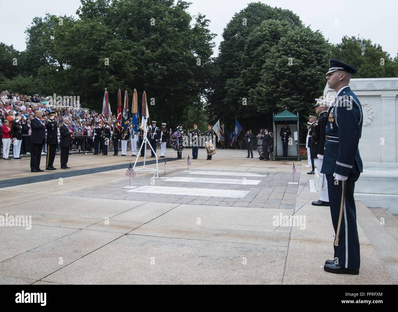 Members of various military honor guards stand at the Tomb of the ...