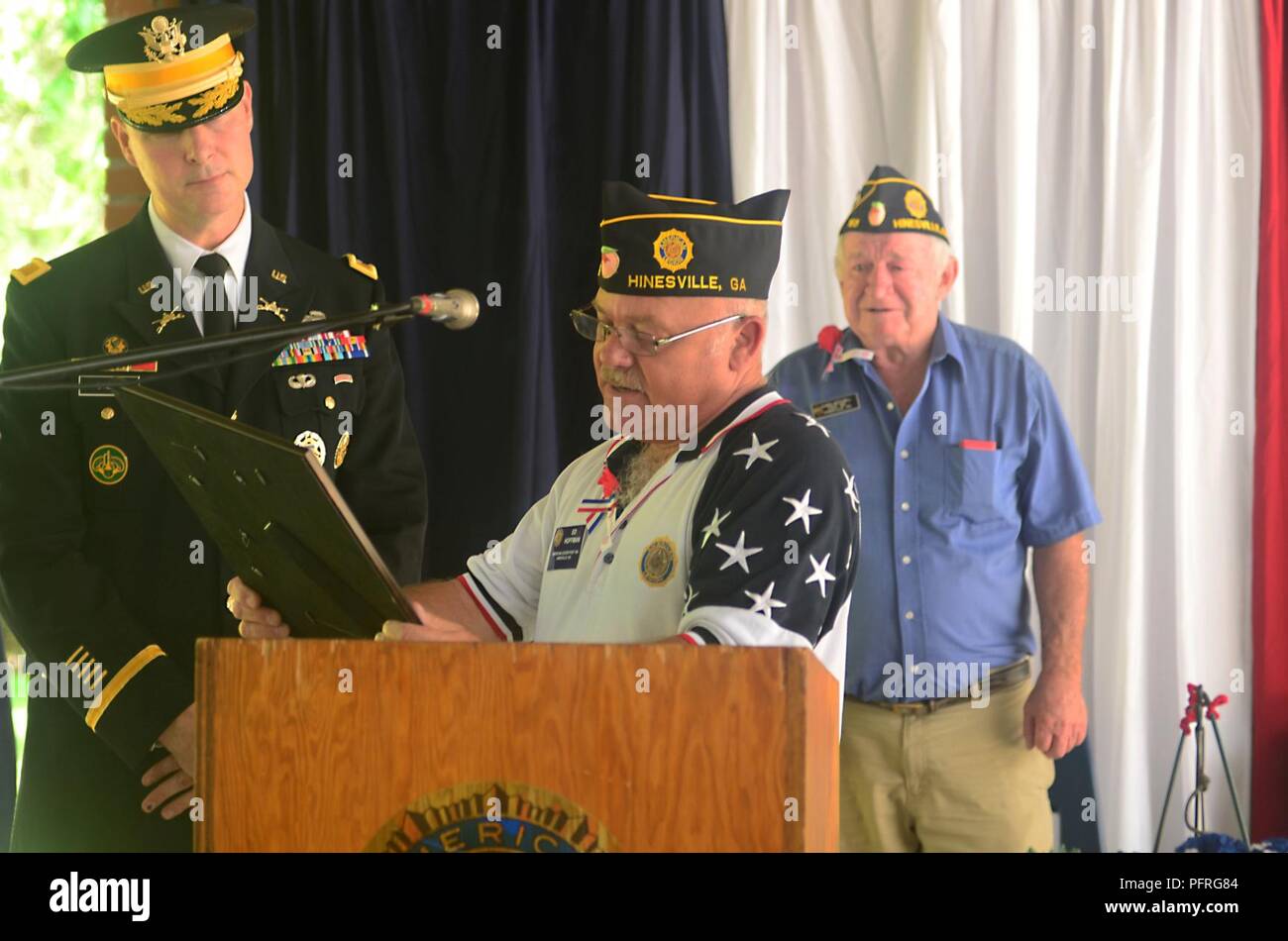 Ed Hoffman, veteran and member of American Legion Post 168 presents a ...