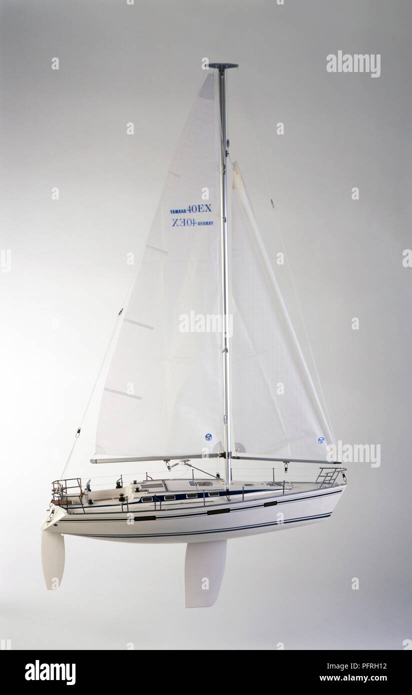 Model of white sailing boat, side view Stock Photo - Alamy