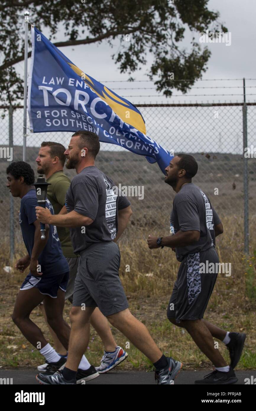 Members of the Naval Criminal Investigative Service, Security and ...