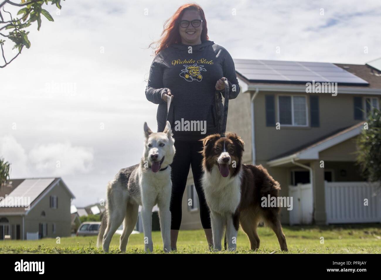 Myranda Beeson and her dogs, Steel and Rover, pose for a photo at the ...