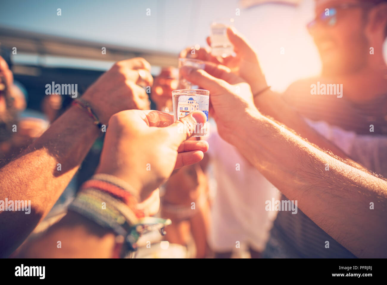 Closeup photo of a happy friends gathering together on openair party ...
