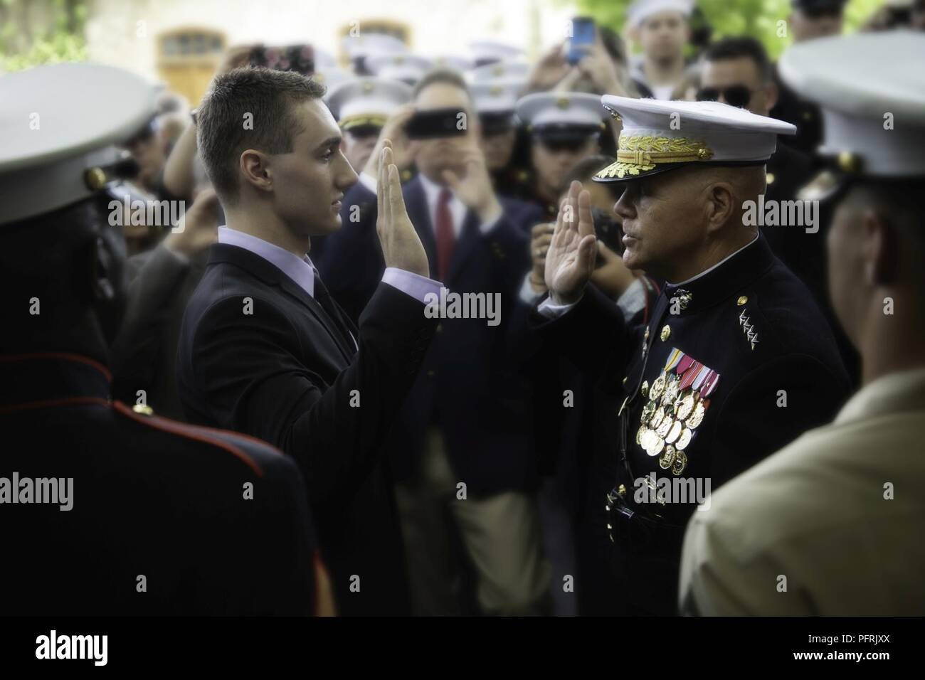 The Commandant of the Marine Corps, Gen Robert B. Neller, administers ...