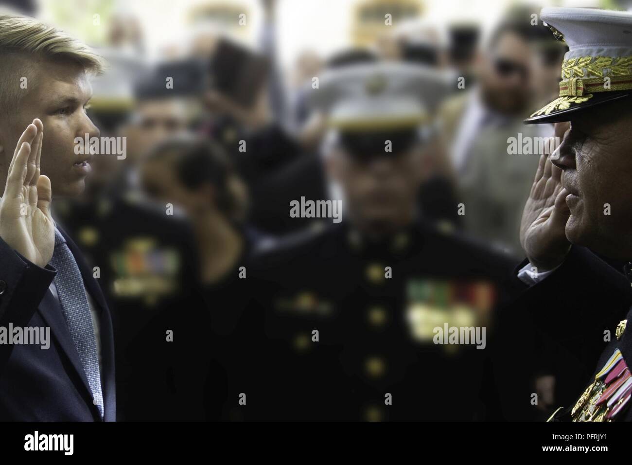 The Commandant of the Marine Corps, Gen Robert B. Neller, administers ...