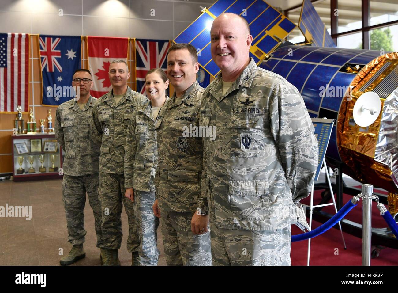 Col. Jack “2 Fish” Fischer, NASA astronaut, stands with base leadership ...