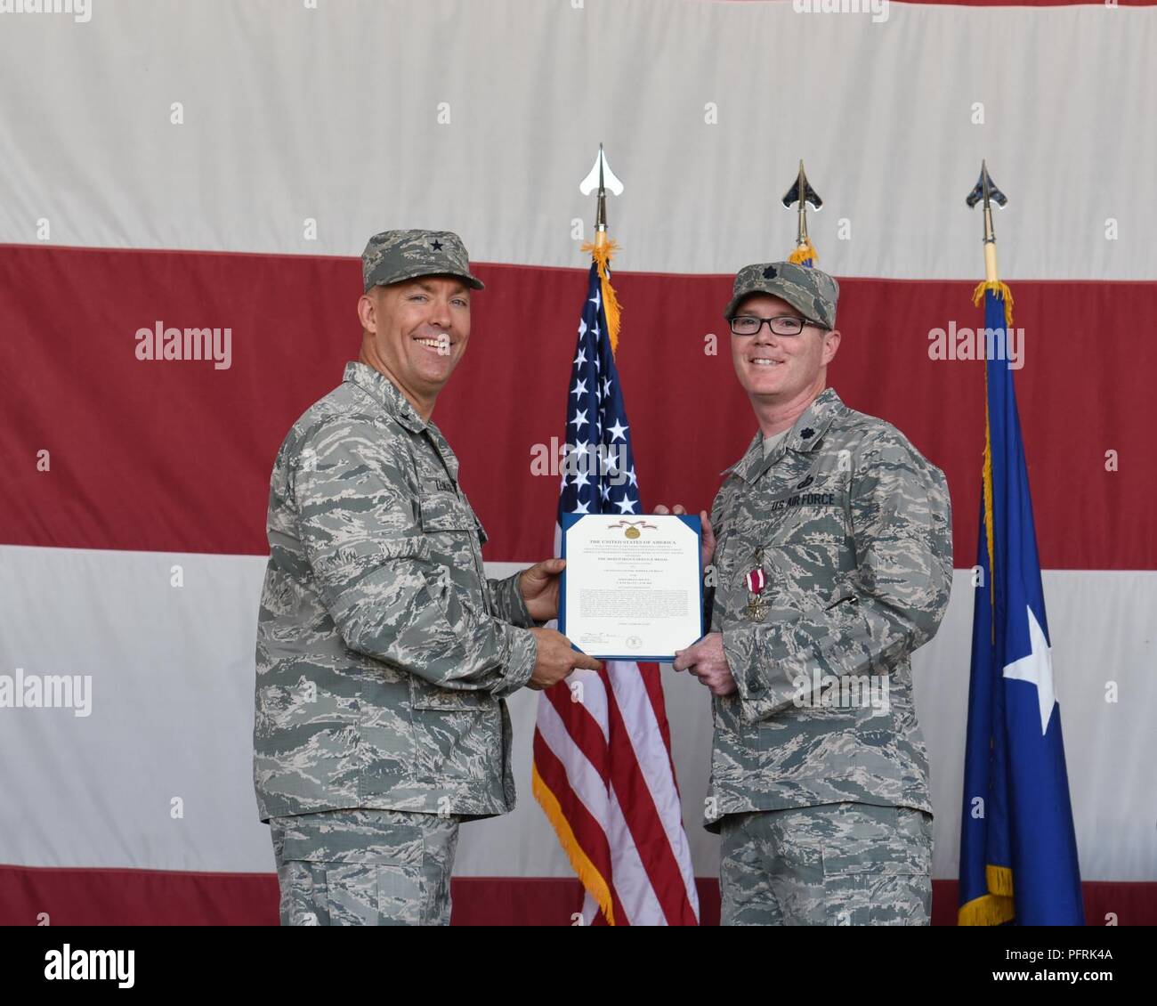 Brig. Gen. Brook Leonard presents Lt. Col. Joseph Nicholas, outgoing ...