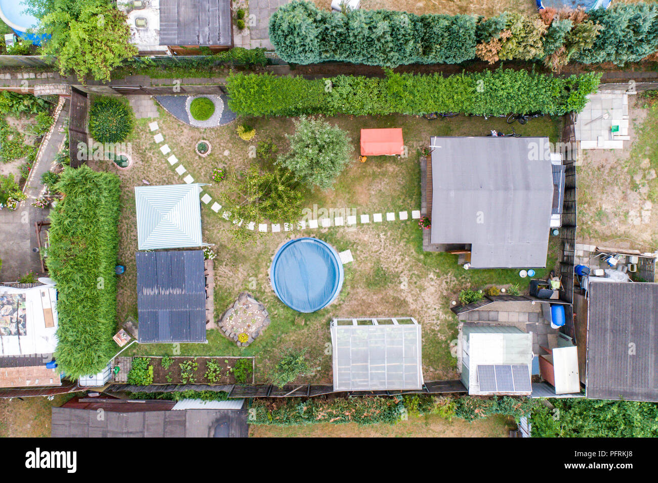 Aerial photo with the drone, a new build-up plot with single houses and ...