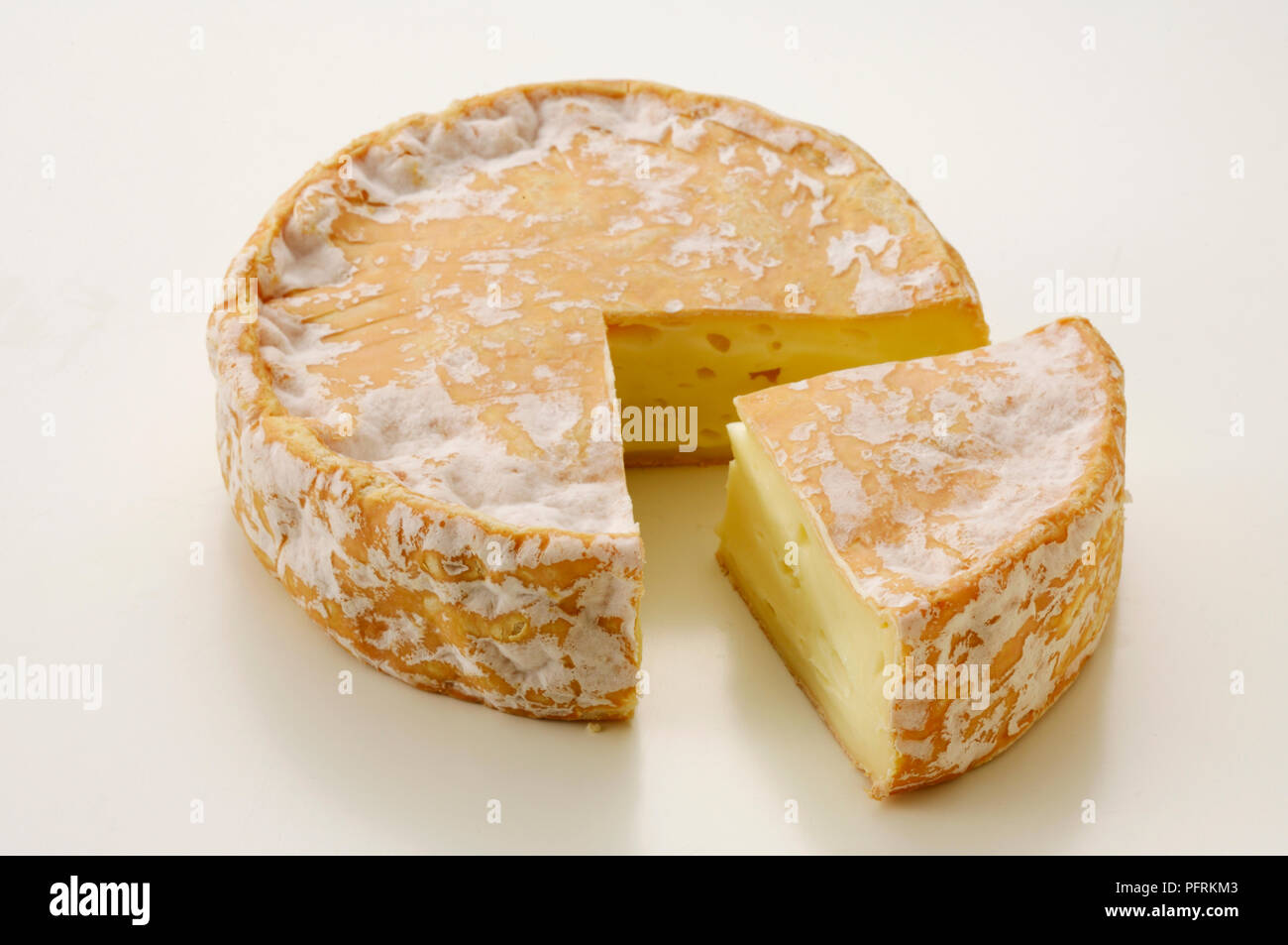 Whole sliced round of Japanese Mori No Cheese Stock Photo - Alamy