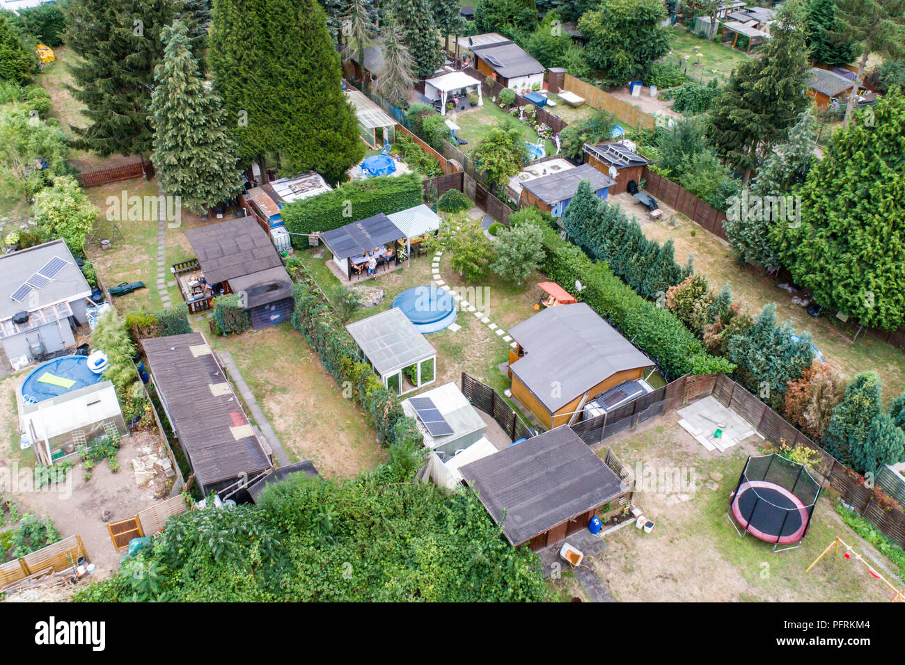 Aerial photo with the drone, a new build-up plot with single houses and ...